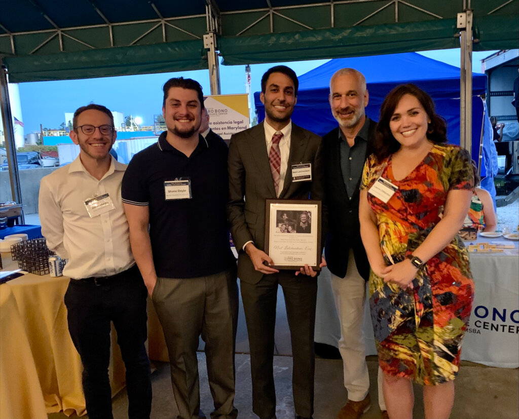 Neel Lalchandani Receives PBRC Service Award - Brown Goldstein Levy